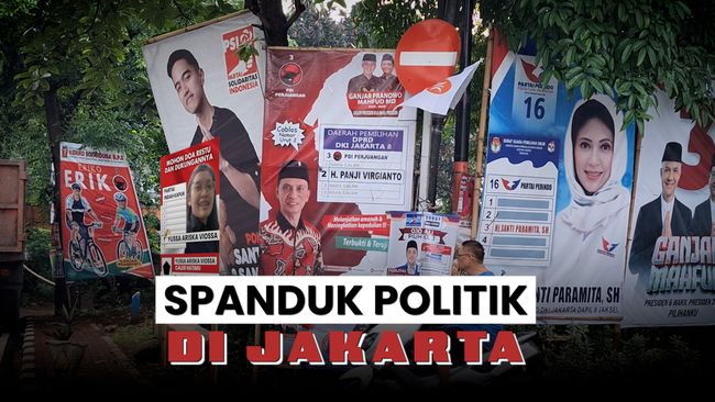 Warna Warni Spanduk Partai-Caleg Penuhi Jalanan Ibu Kota